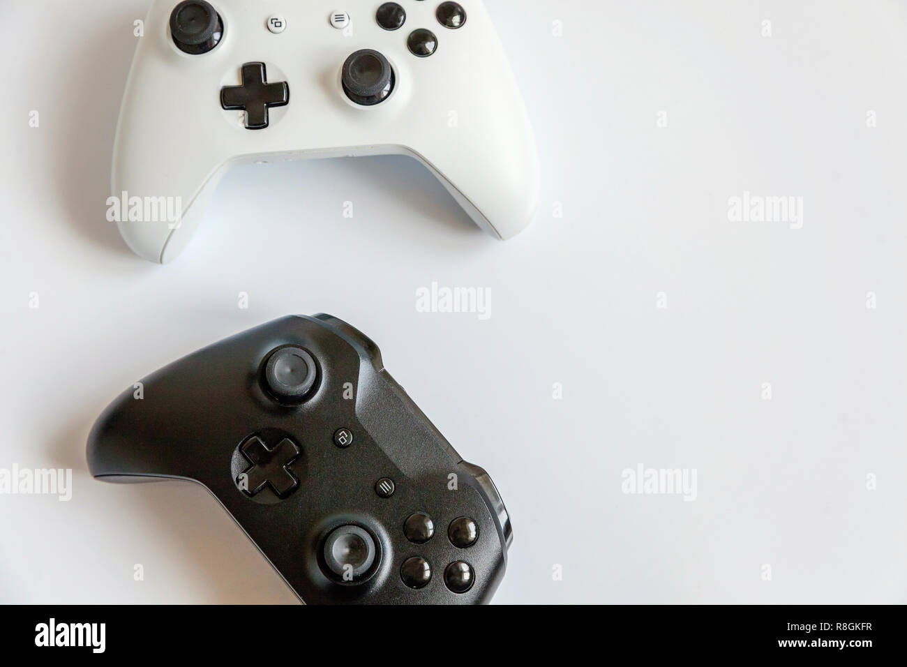 White and black two joystick gamepad, game console isolated on white ...