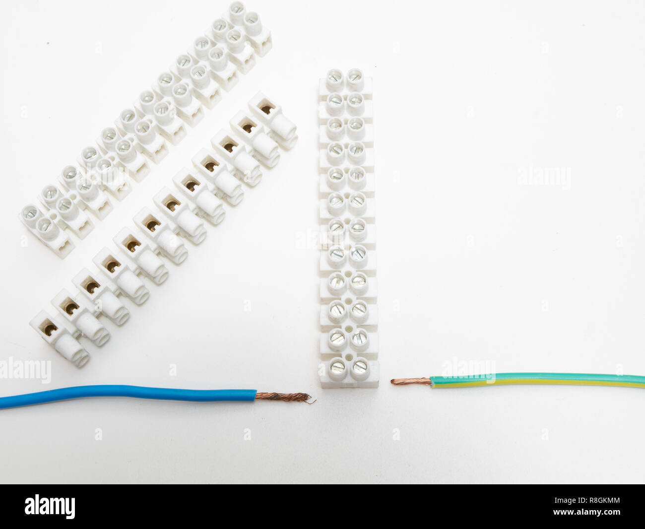 three copper wire connection boards on white with two wires Stock Photo ...