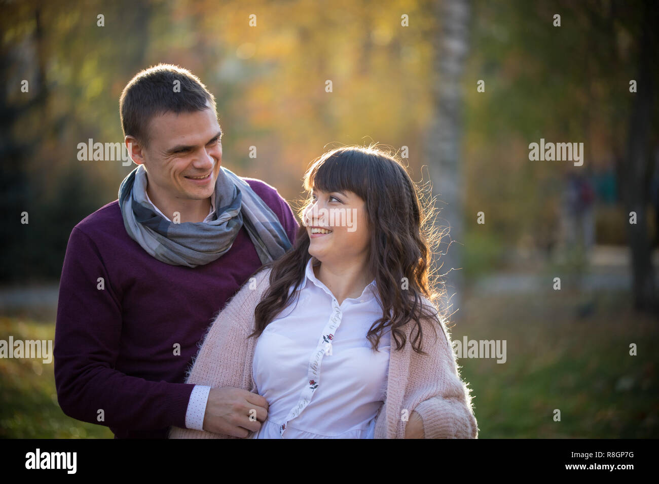 A couple in love looks into each other's eyes in the autumn park Stock ...
