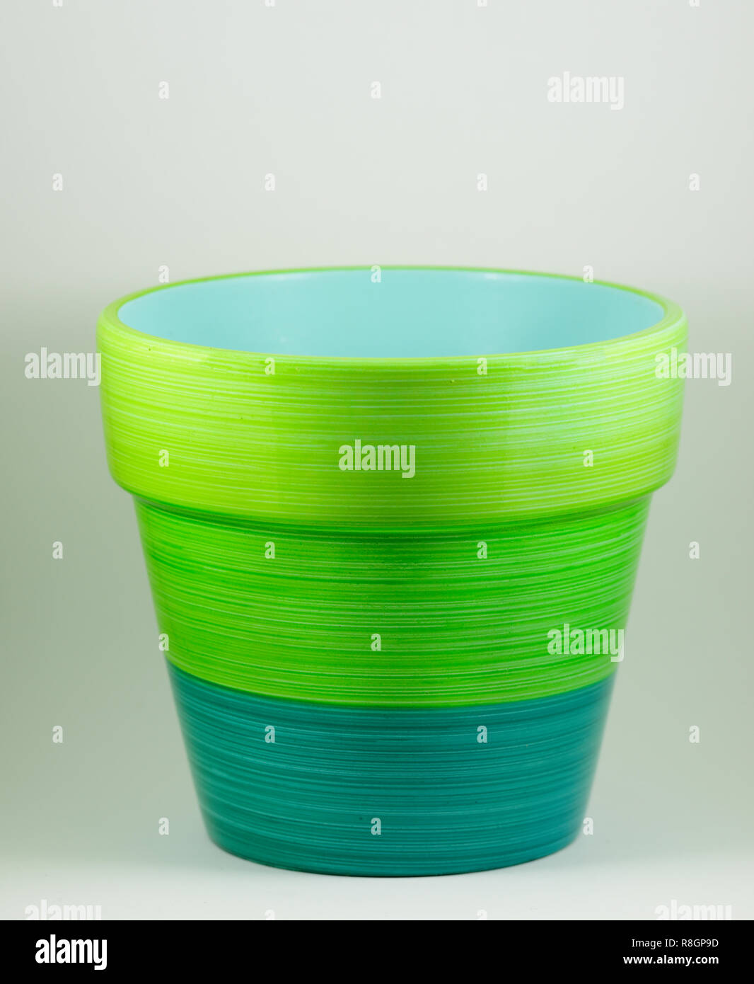 empty clay flower pot on a neutral background Stock Photo - Alamy