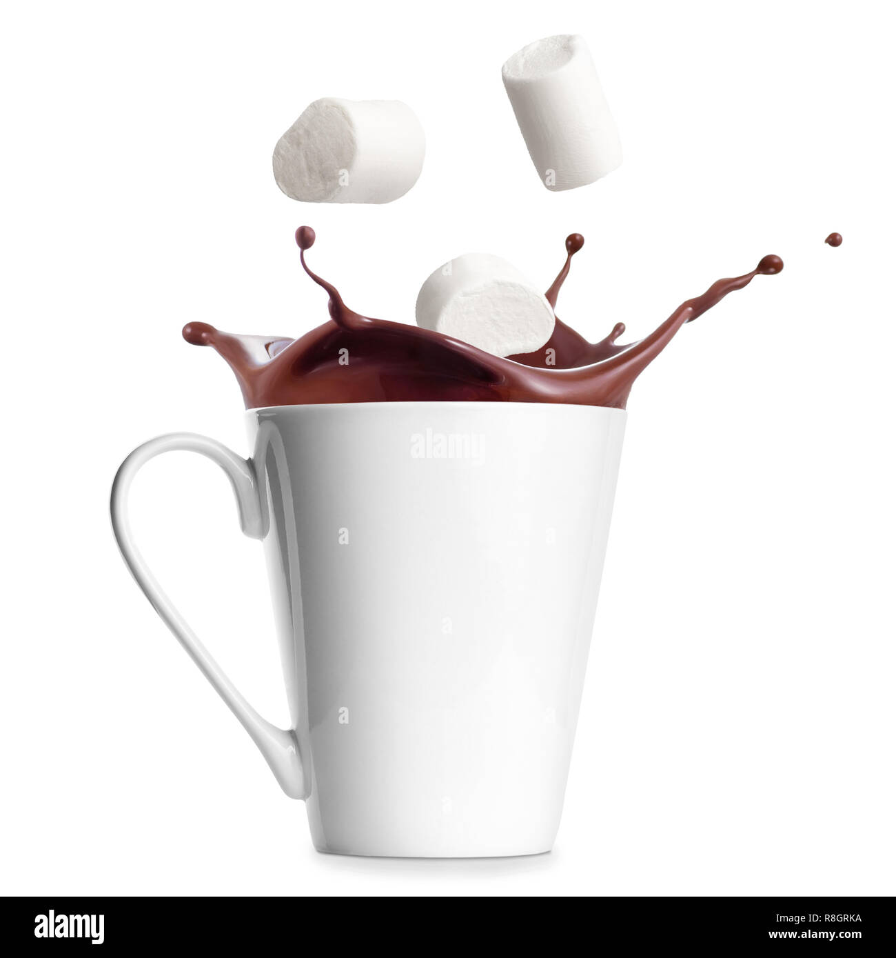 marshmallows falling into cup with hot chocolate or cocoa and creating ...