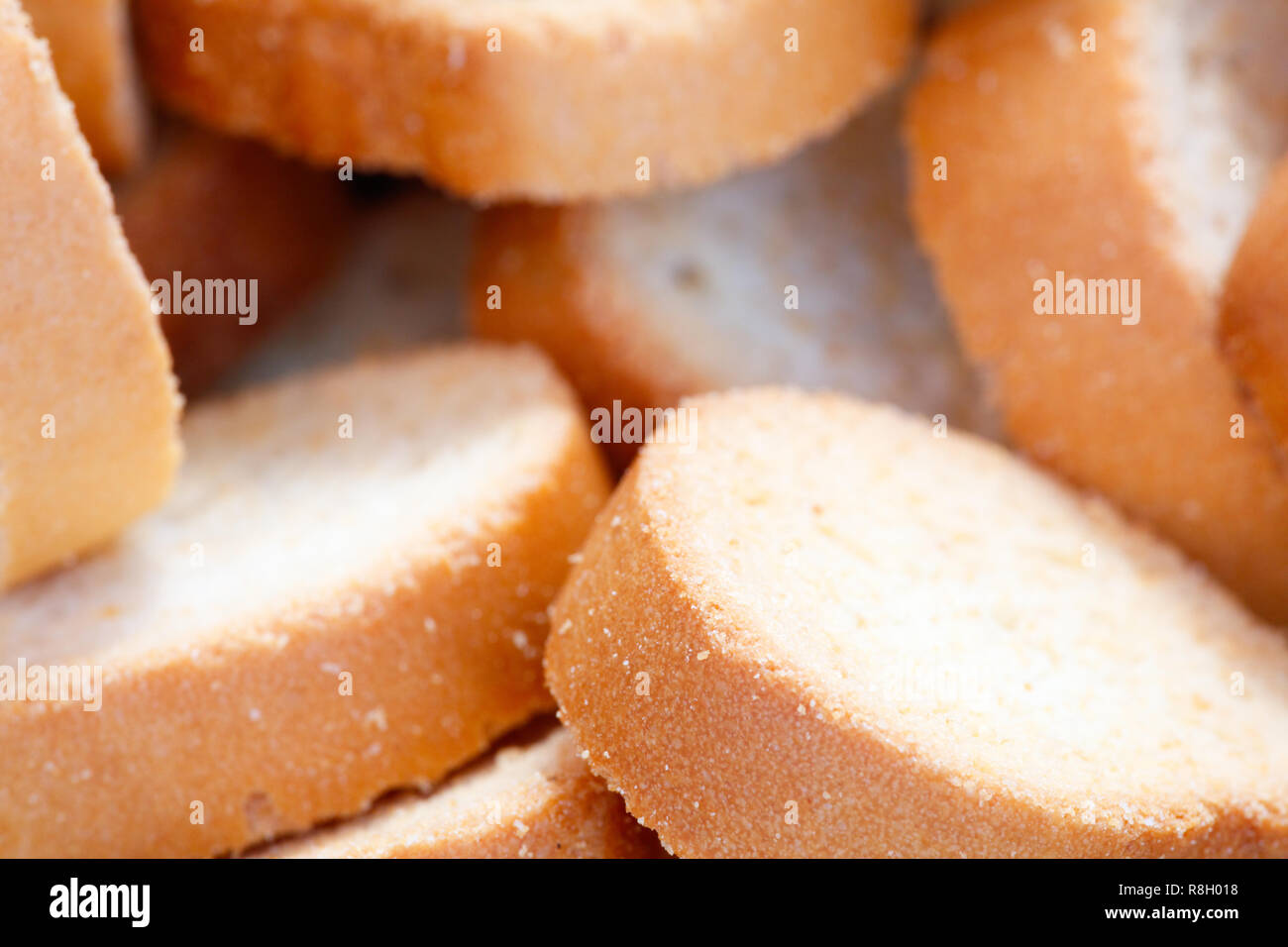 Many closeup round hard bread chucks crackers, breakfast concept ...