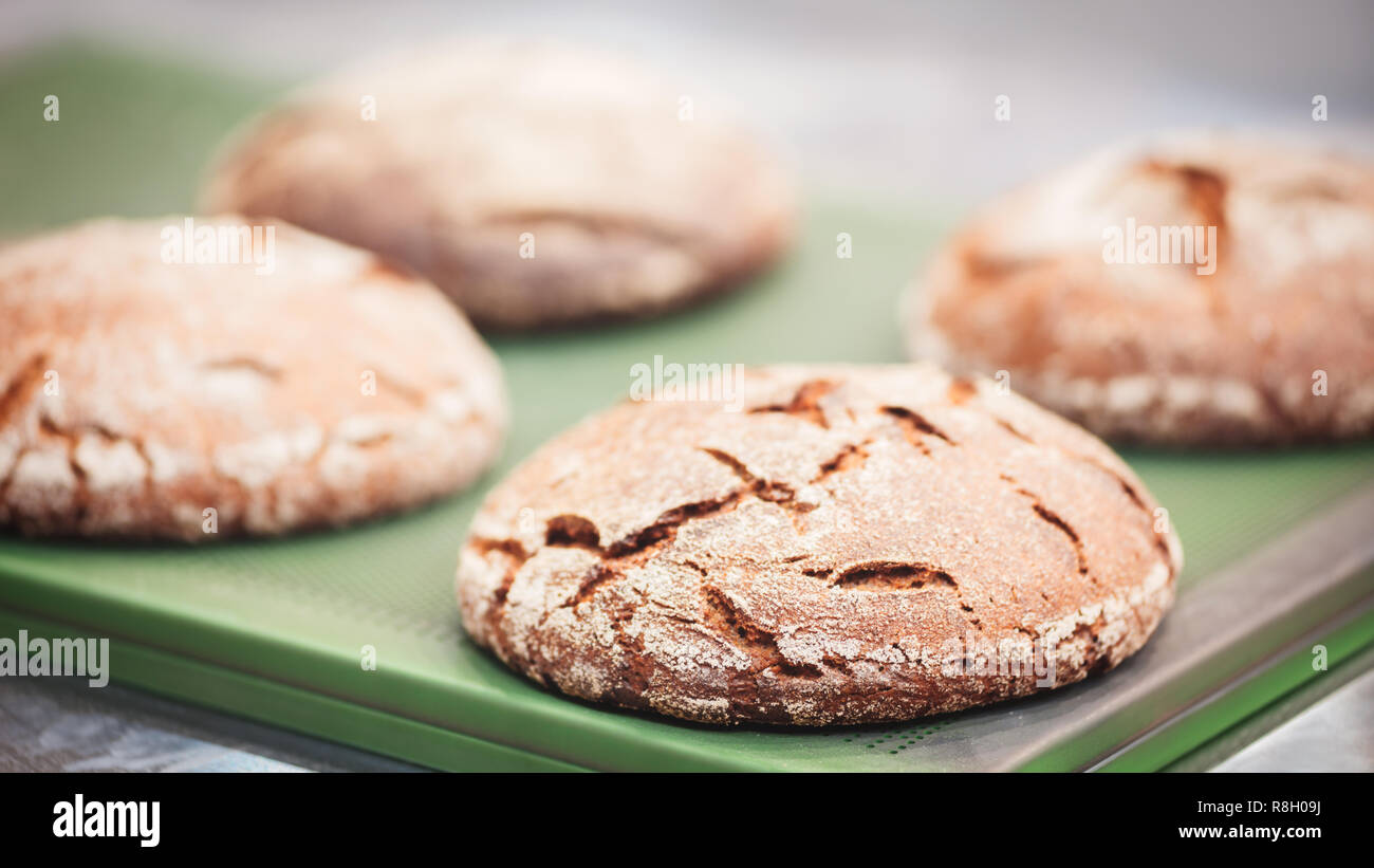 Breads on the desk in the bakery Stock Photo - Alamy