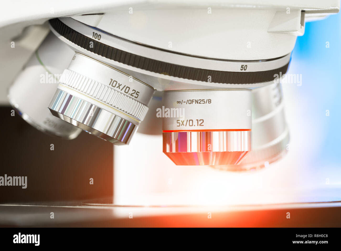 Close up of examining of test sample under the microscope in laboratory ...