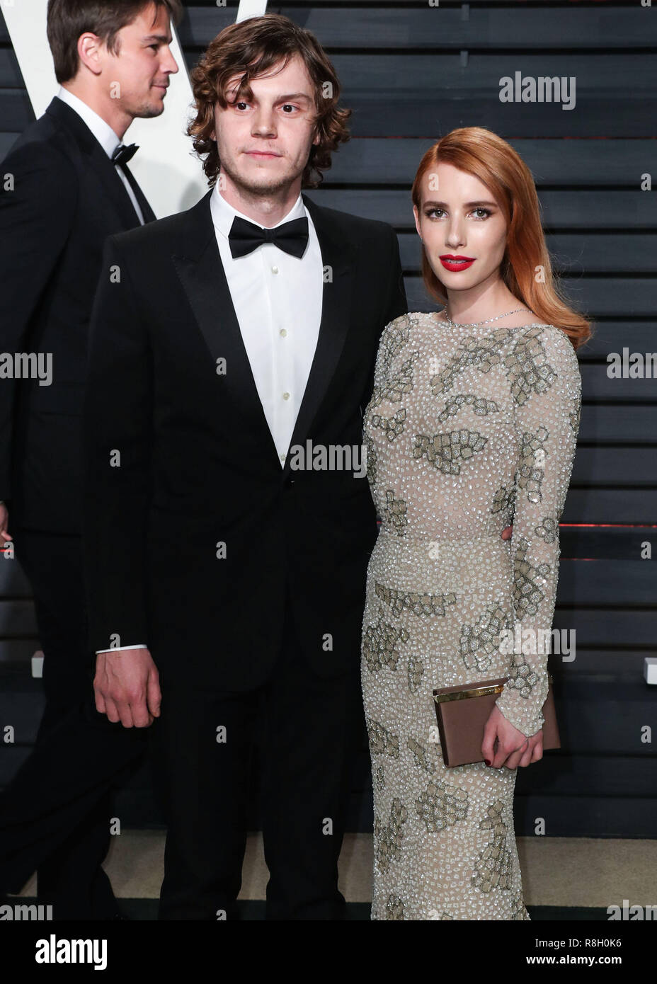 BEVERLY HILLS, LOS ANGELES, CA, USA - FEBRUARY 26: Evan Peters, Emma ...