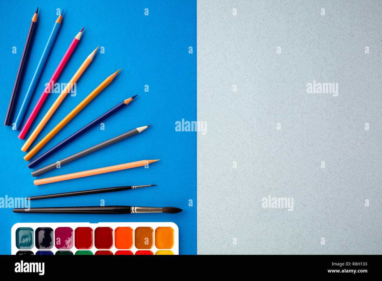 Back to school concept on blue texture paper background Stock Photo - Alamy
