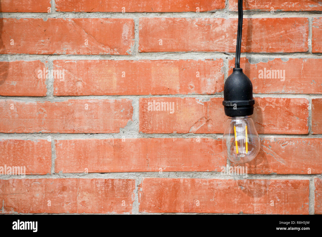 lamp on brick wall interior design Stock Photo - Alamy