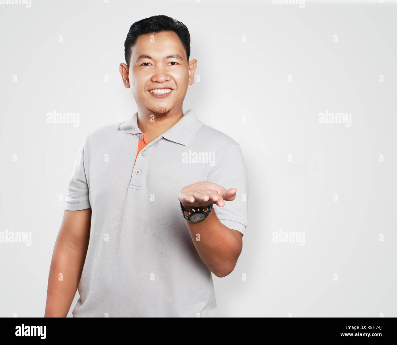 Photo image portrait of a cute handsome young Asian man smiling and ...