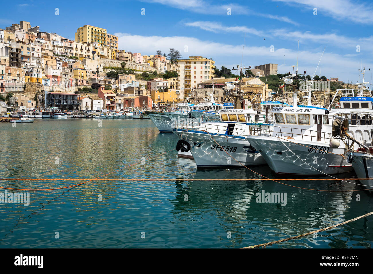 Picturesque view of Sciacca harbour, full of fishing boats. Sciacca ...
