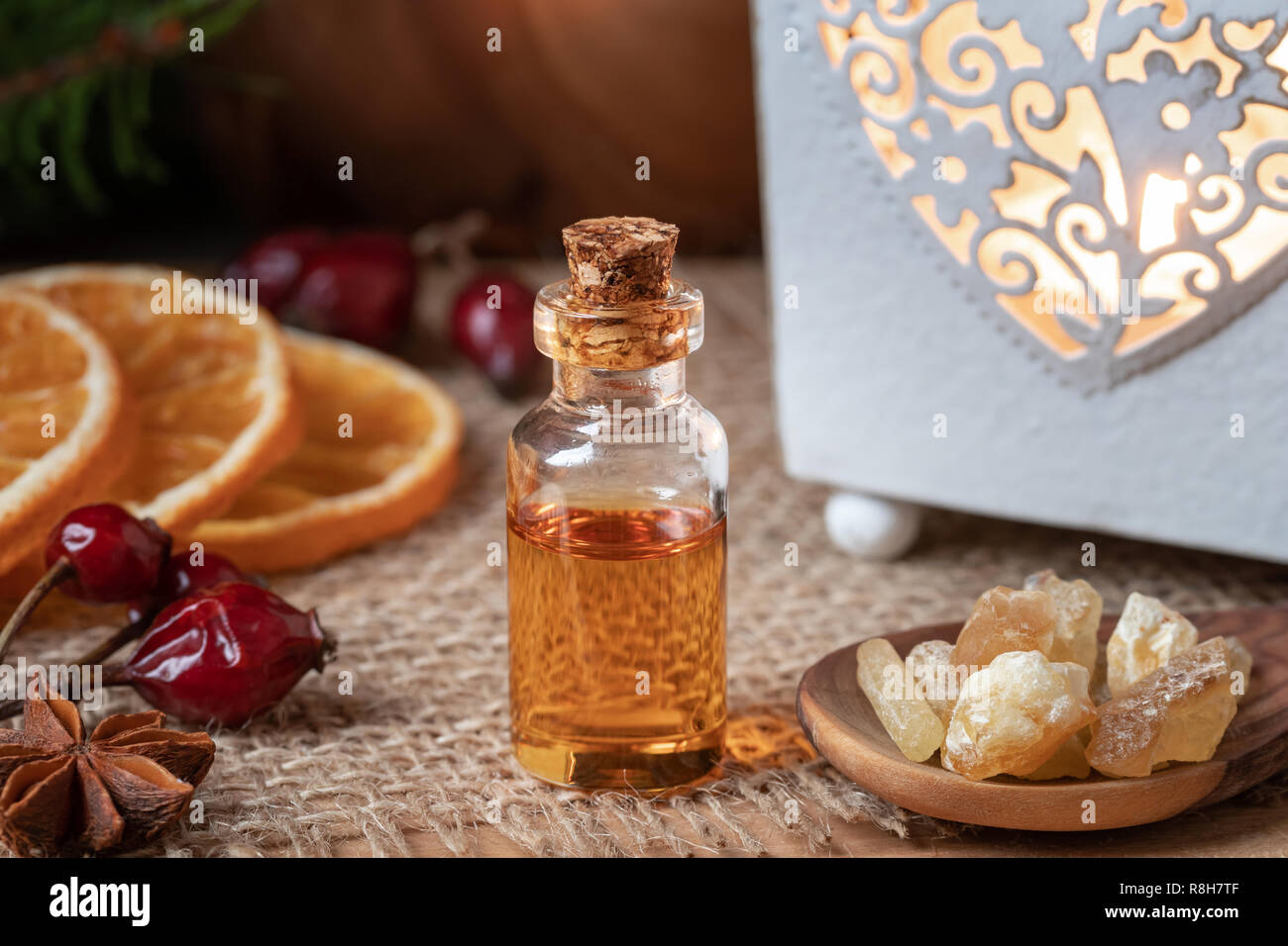 A bottle of essential oil with frankincense resin Stock Photo - Alamy