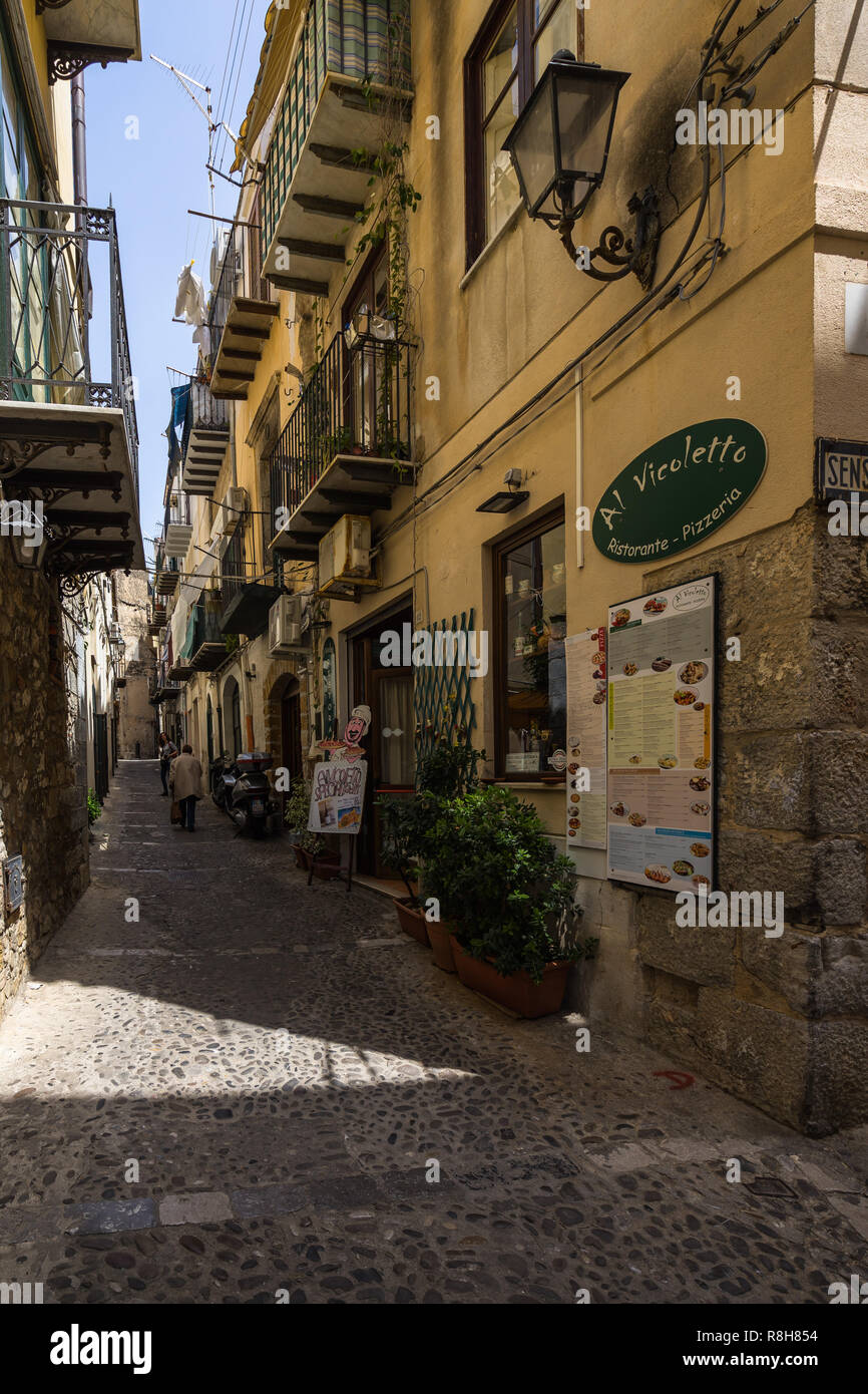 Typical narrow street in Cefalù old town. Cefalù, Palermo province ...