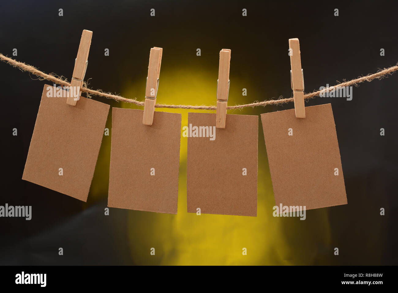 Blank Paper reminder hanging with rope on gradient background Stock ...