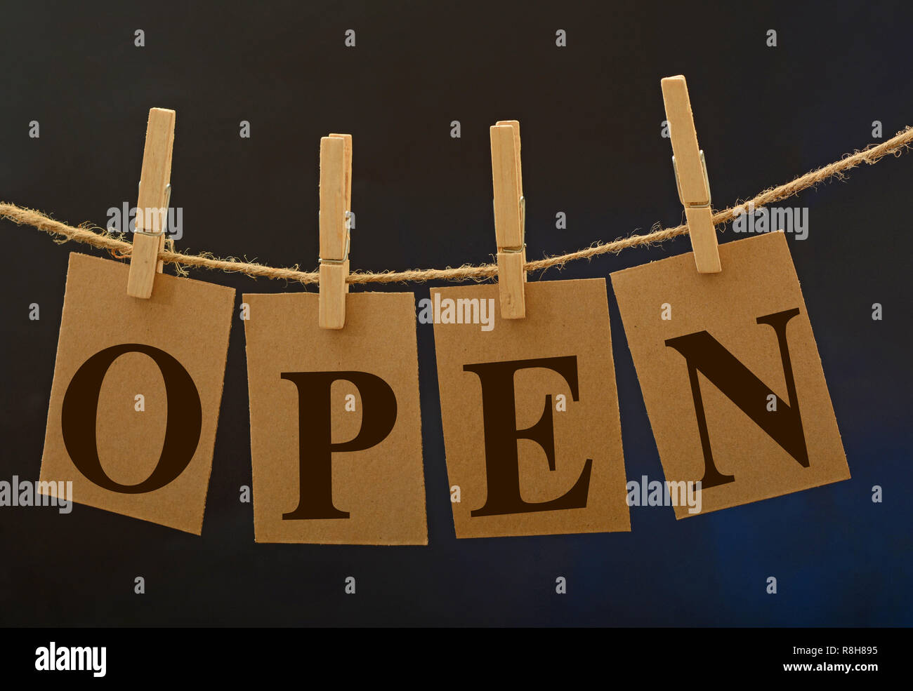 open text reminder hanging with ropes on Gray background Stock Photo ...