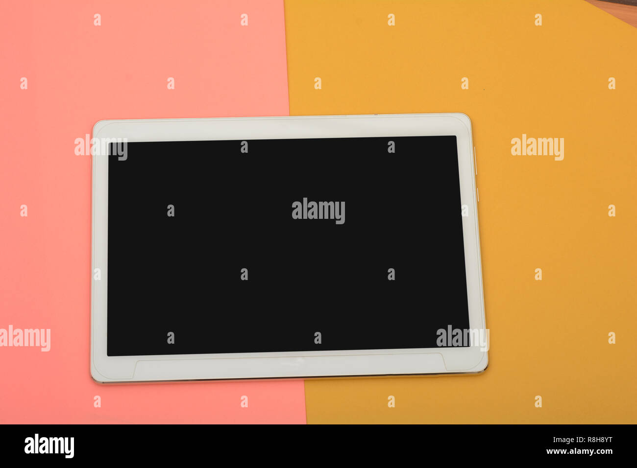 Blank screen white tablet on Multi Color background Stock Photo - Alamy