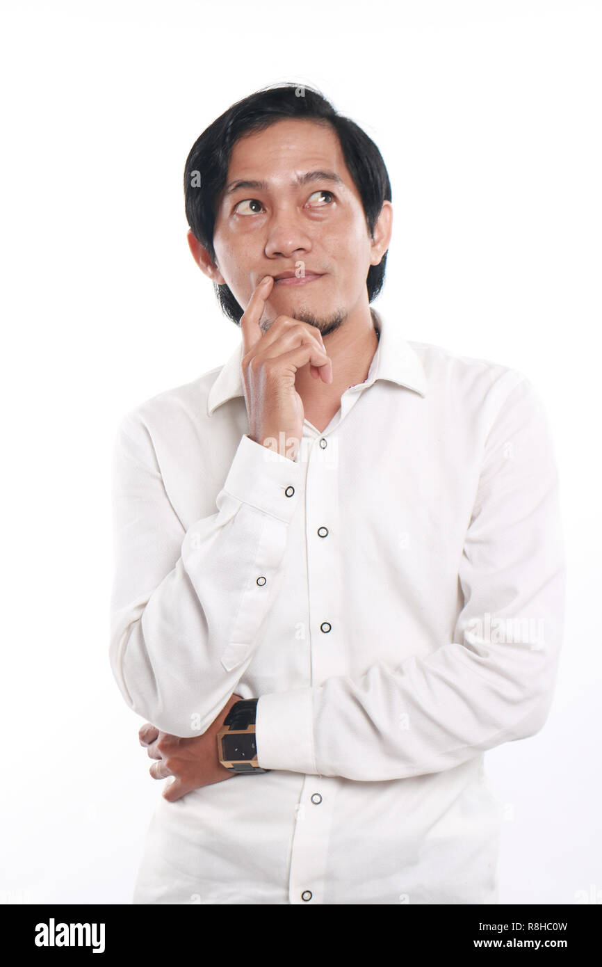 Photo image portrait of a funny young Asian businessman looked happy ...