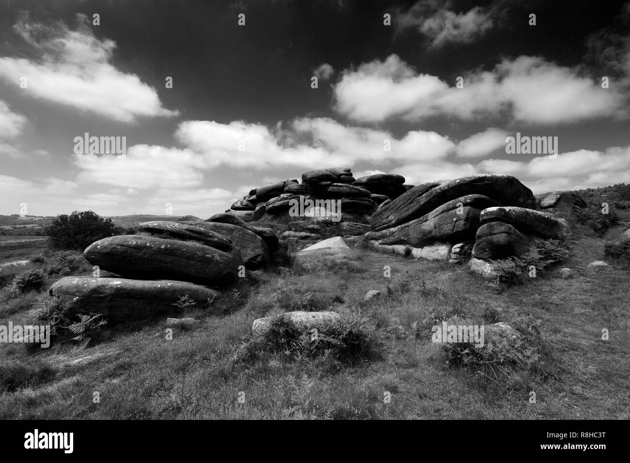 Gritstone rock formations on Lawrence Field, Grindleford village ...