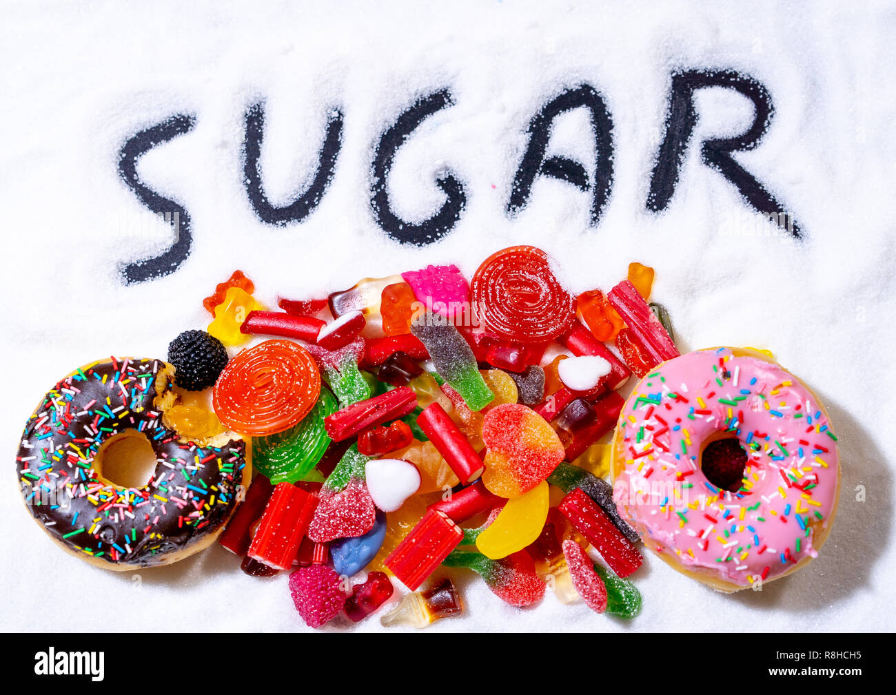 Colorful selection of different sweets candies and treats with word ...