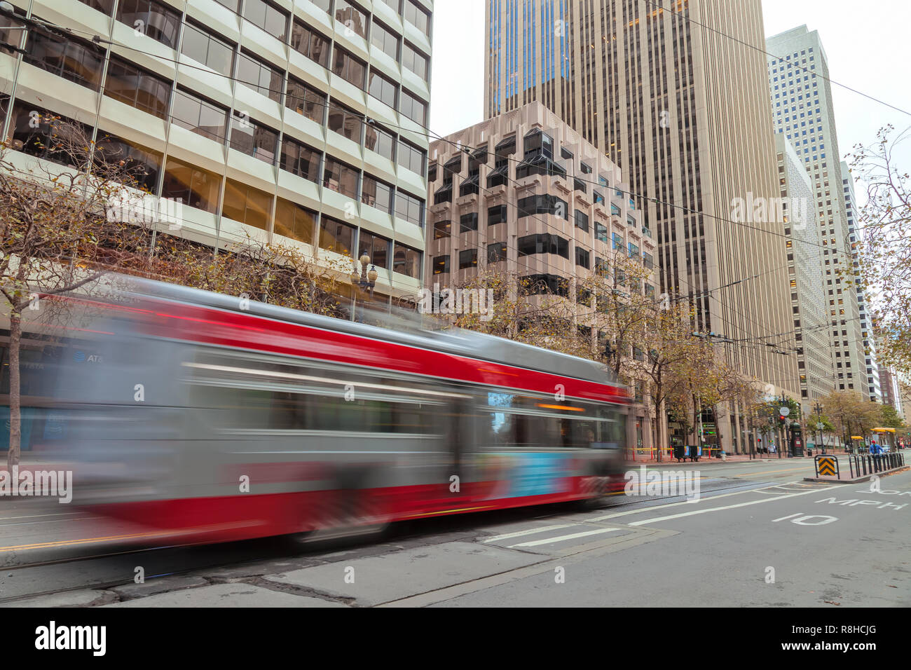 Trolley buses in motion on the Market Street in San Francisco ...