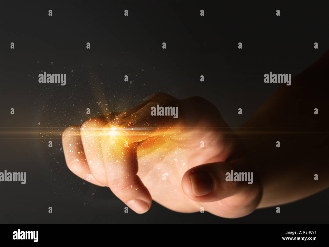 Female finger touching a beam of light Stock Photo - Alamy