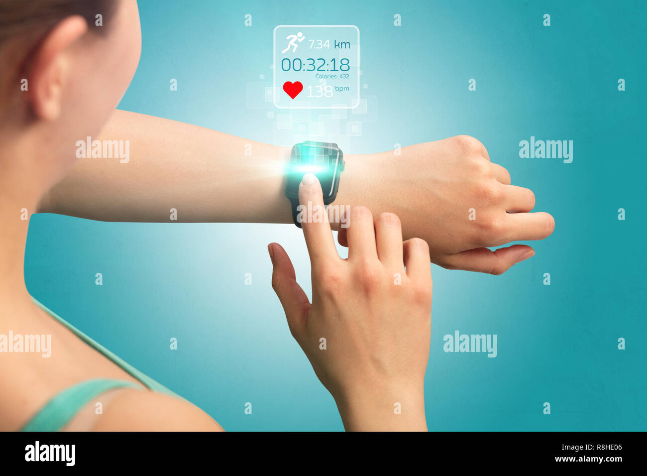 Female hand with smartwatch and running concept above Stock Photo - Alamy