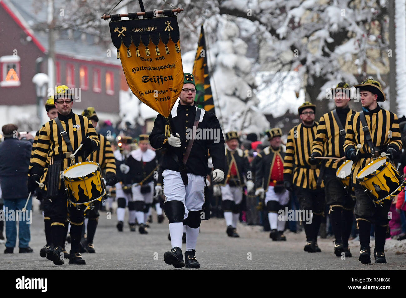 Seiffen, Germany. 15th Dec, 2018. Miners roam through Seiffen in their ...