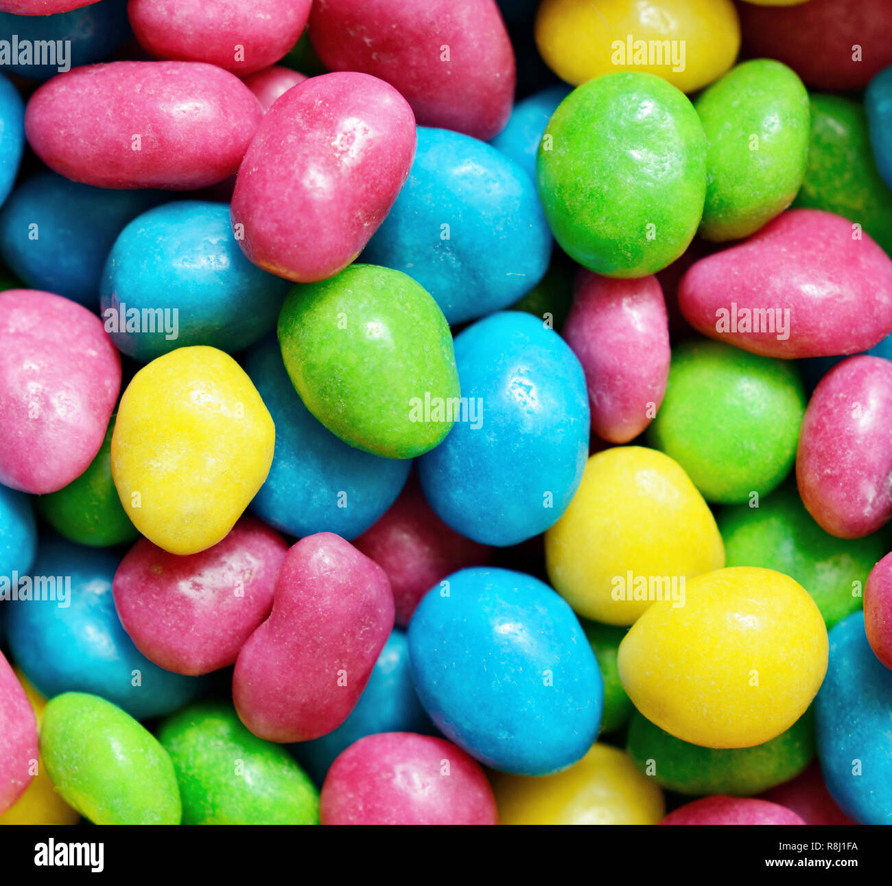 Raisins in a colorful glaze Stock Photo - Alamy