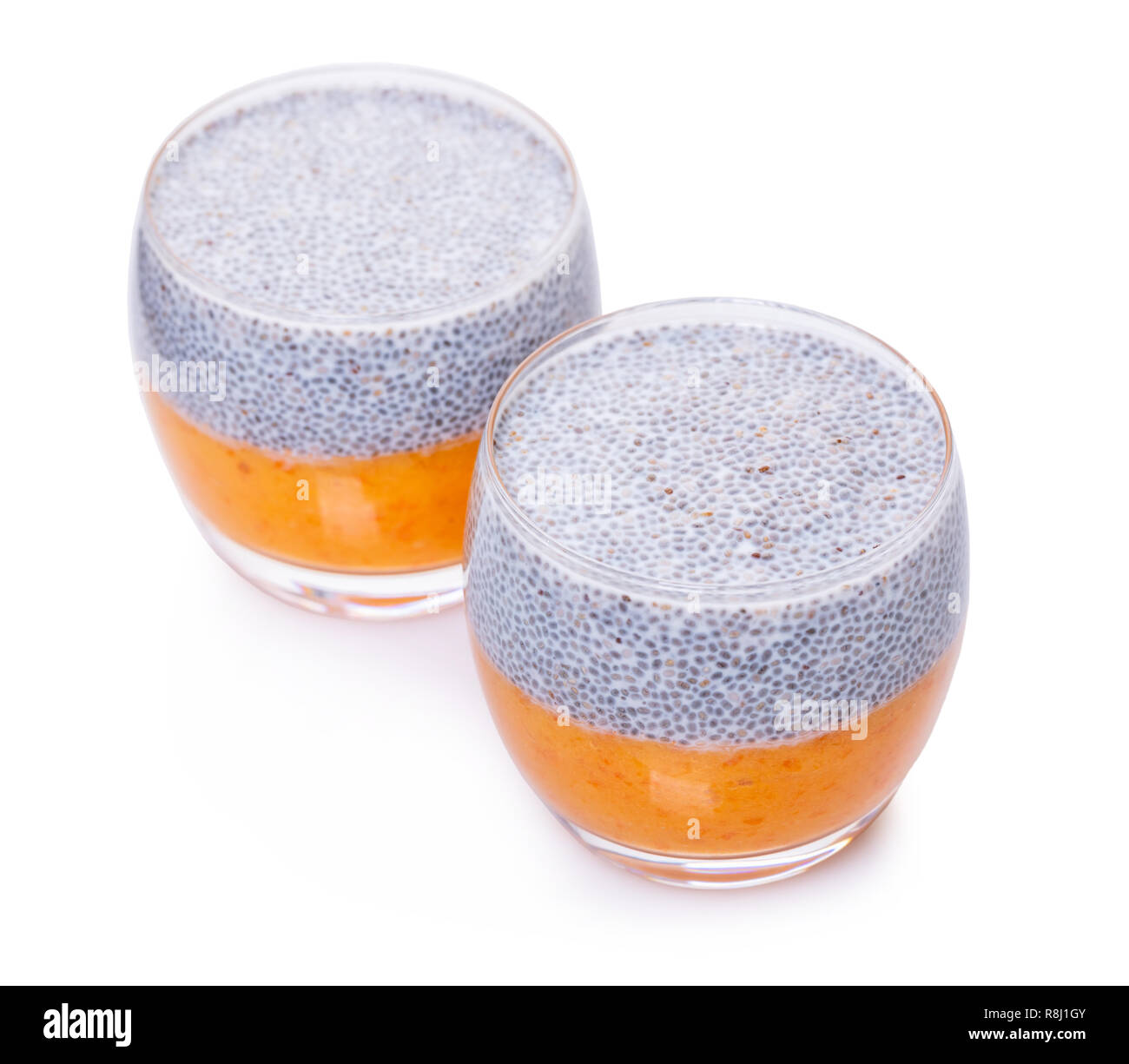 chia pudding in a glass on white isolated background Stock Photo - Alamy
