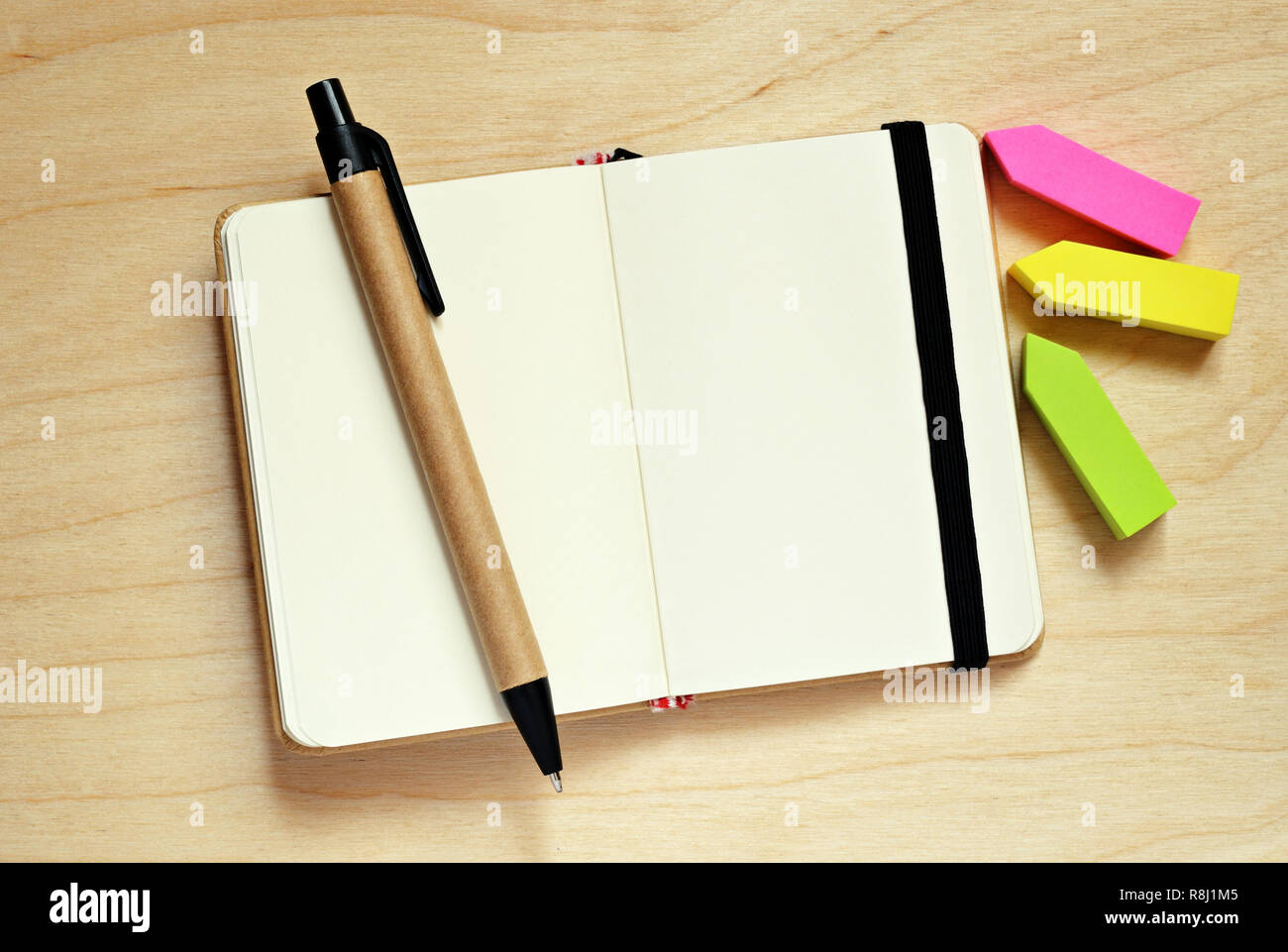 Opened notebook on a table hi-res stock photography and images - Alamy