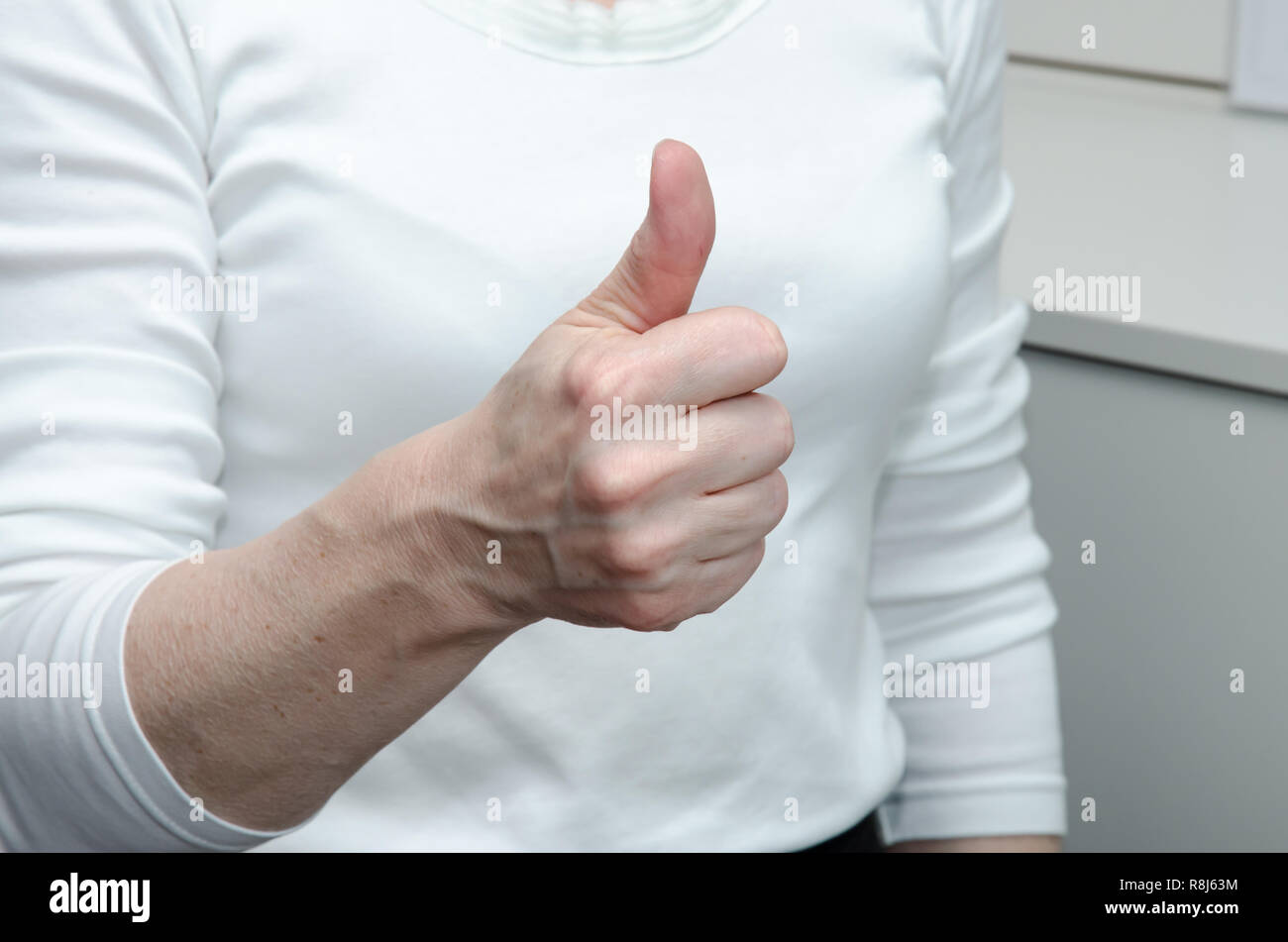 hand with yes gesture on white background Stock Photo - Alamy