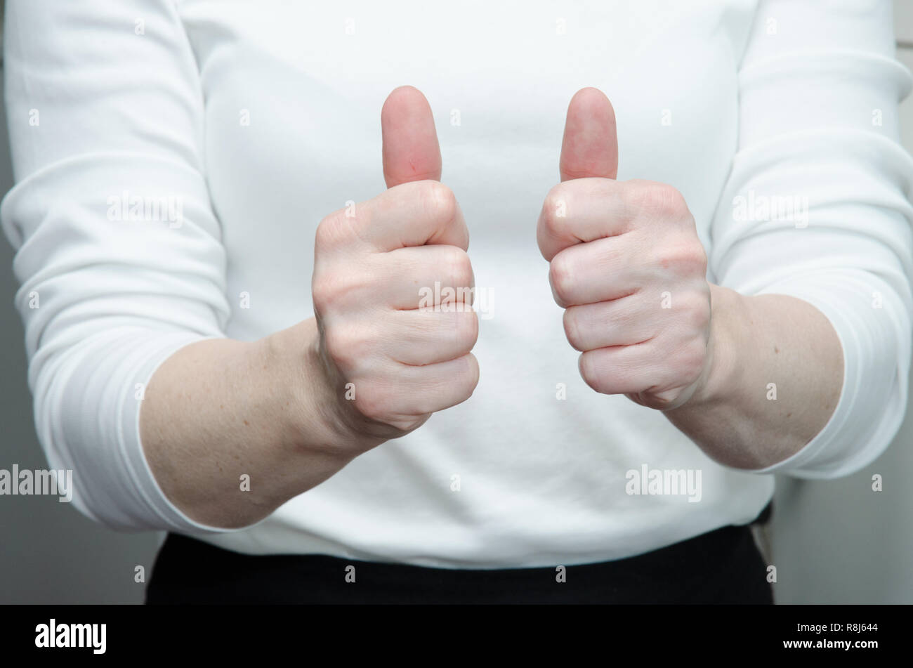 hand with yes gesture on white background Stock Photo - Alamy