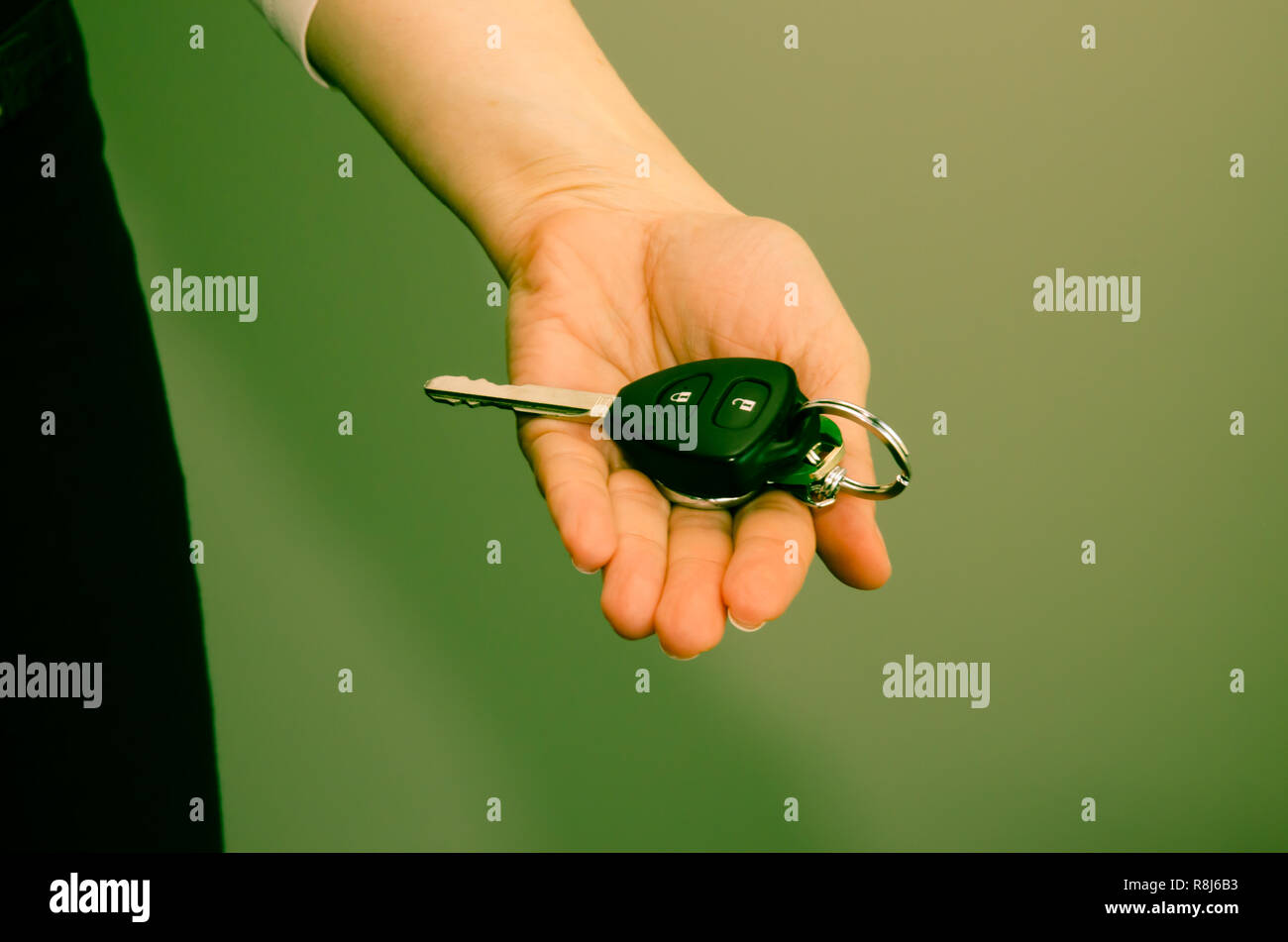 hand with keys on white background Stock Photo - Alamy
