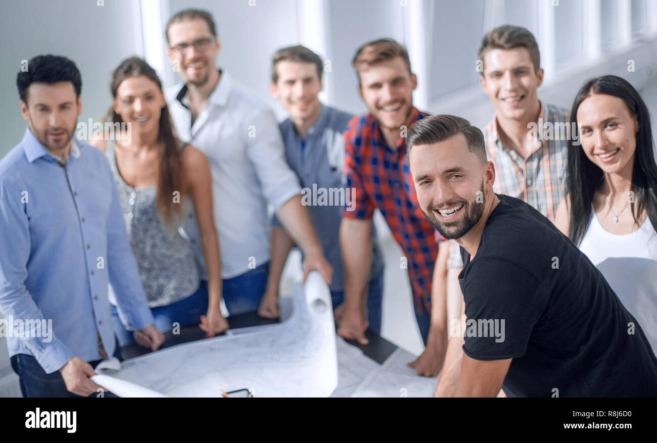 architect on the background of the project office staff Stock Photo - Alamy
