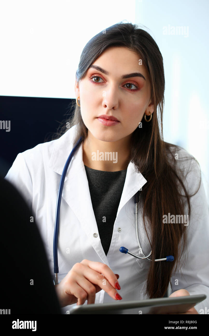Beautiful female medicine doctor explain Stock Photo - Alamy