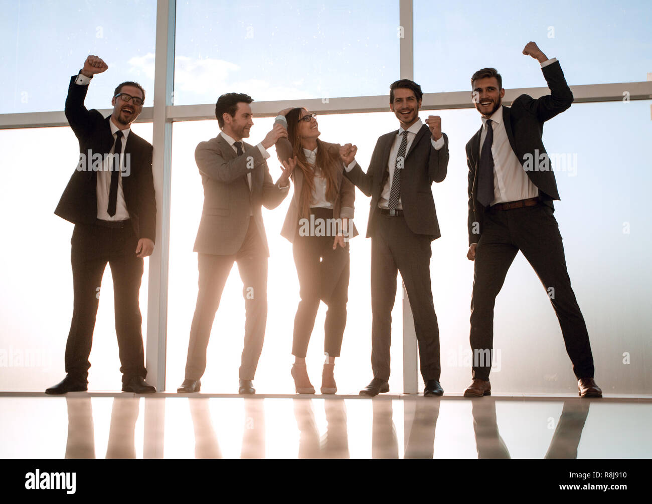 A group of people with great success holds Stock Photo - Alamy