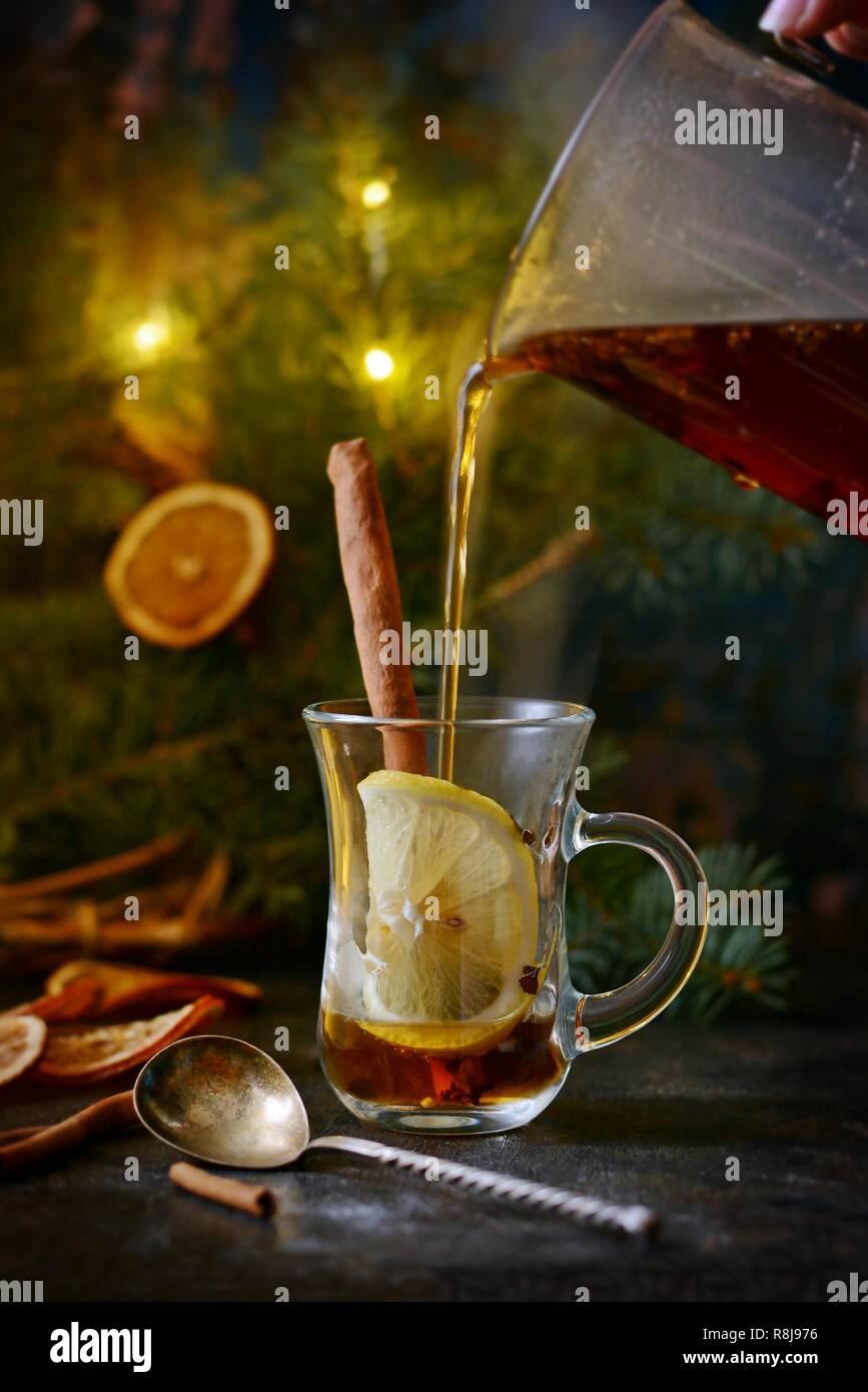 Christmas tea with orange and spices. Selective focus. Hot spicy tea on ...
