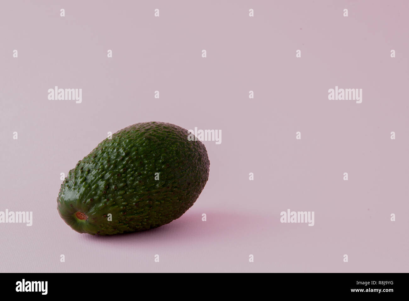 Green avocado pattern on pink background. Pop art design, creative ...