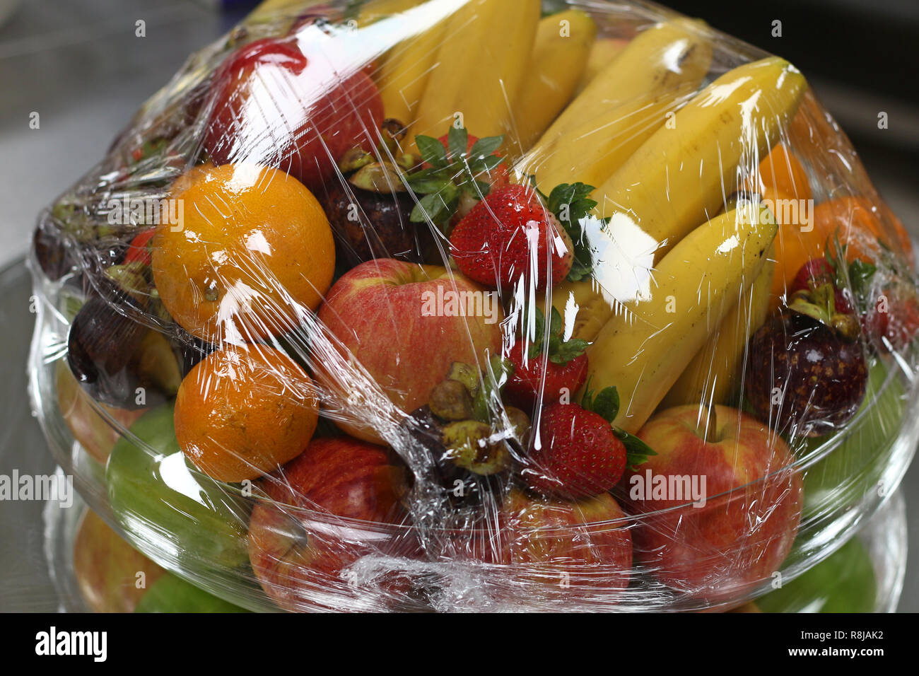 Fruits in plastic wrap hi-res stock photography and images - Alamy
