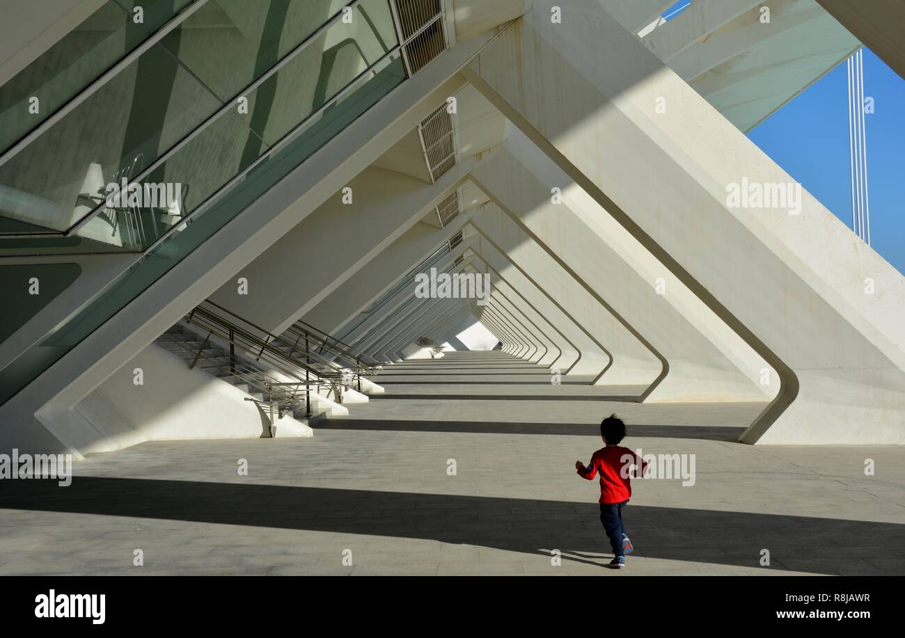 boy running in a modern building, architecture Stock Photo - Alamy
