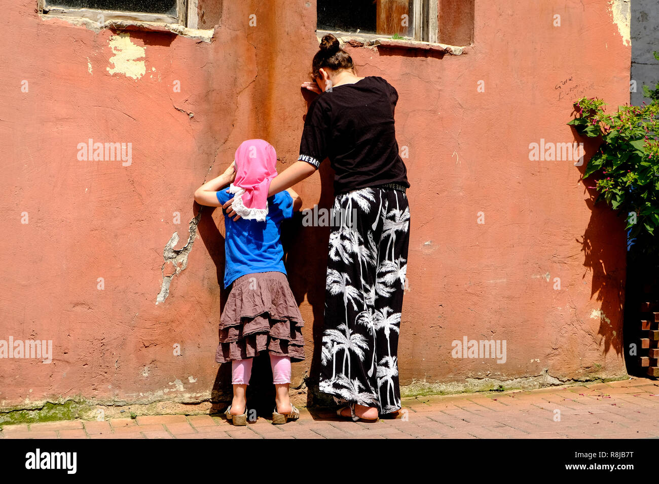 Kids Playing Hide And Seek In The House