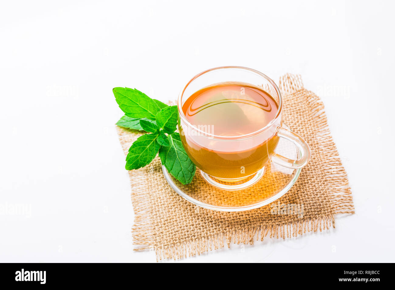 Mint tea. Cup of tea with fresh mint leaves on a white background Stock ...