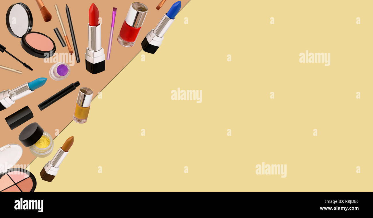 Makeup Items falling on banner template with copy space Stock Photo - Alamy