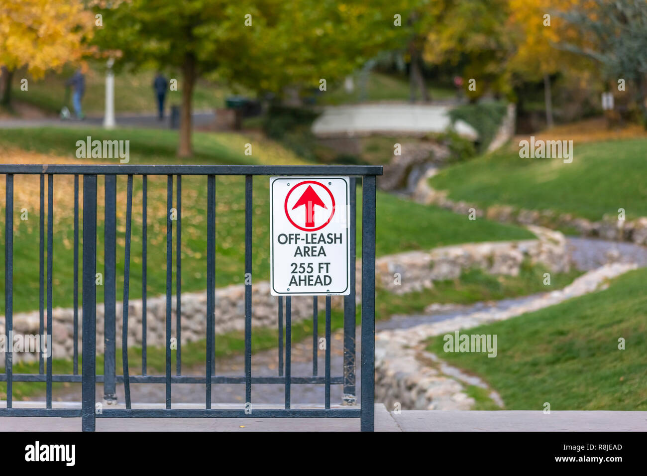 Off leash area sign on bridge Salt Lake Stock Photo - Alamy