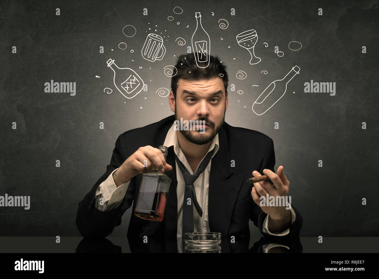 Drunk down and out man with doodle alcohol bottles concept Stock Photo ...