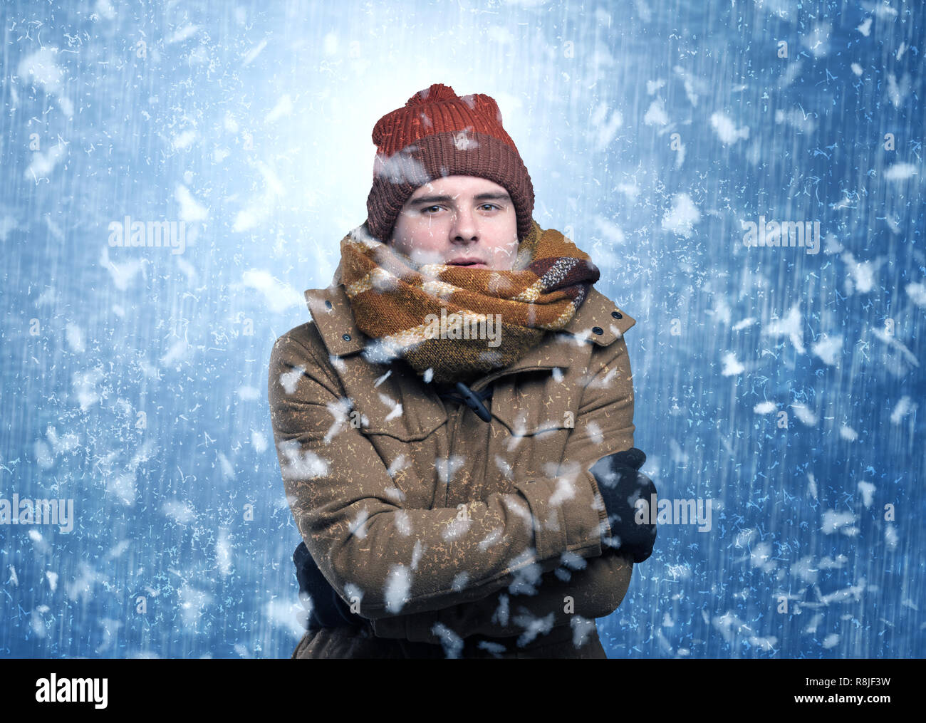 Handsome young boy shivering and trembling at snowstorm concept Stock ...