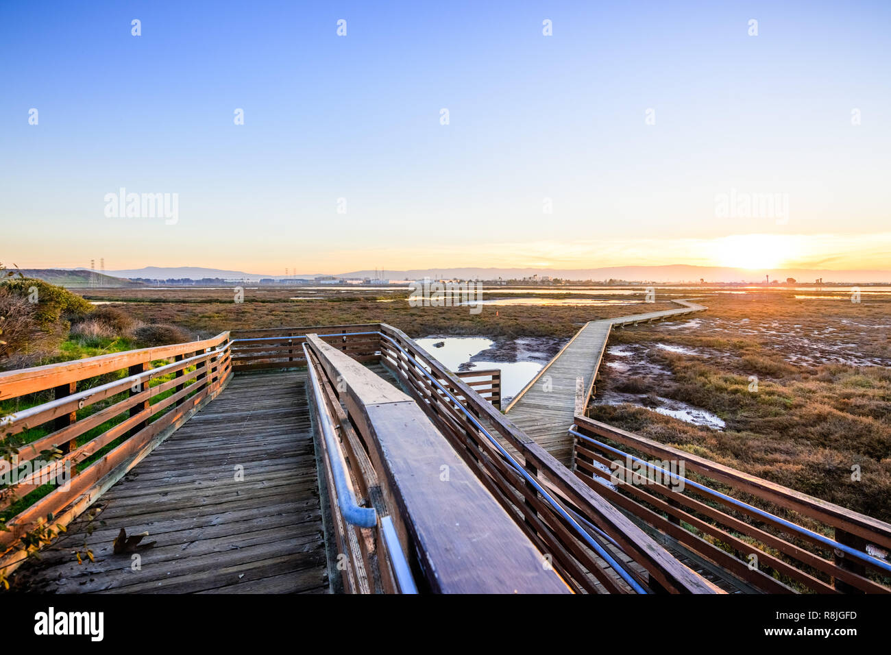 Wooden boardwalk through the tidal marshes of Alviso, Don Edwards San ...