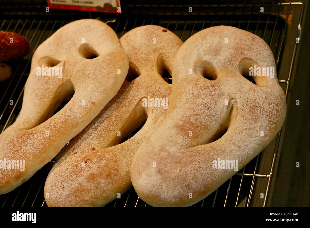 Fun scary bread faces baked for Halloween in a bakery Stock Photo - Alamy