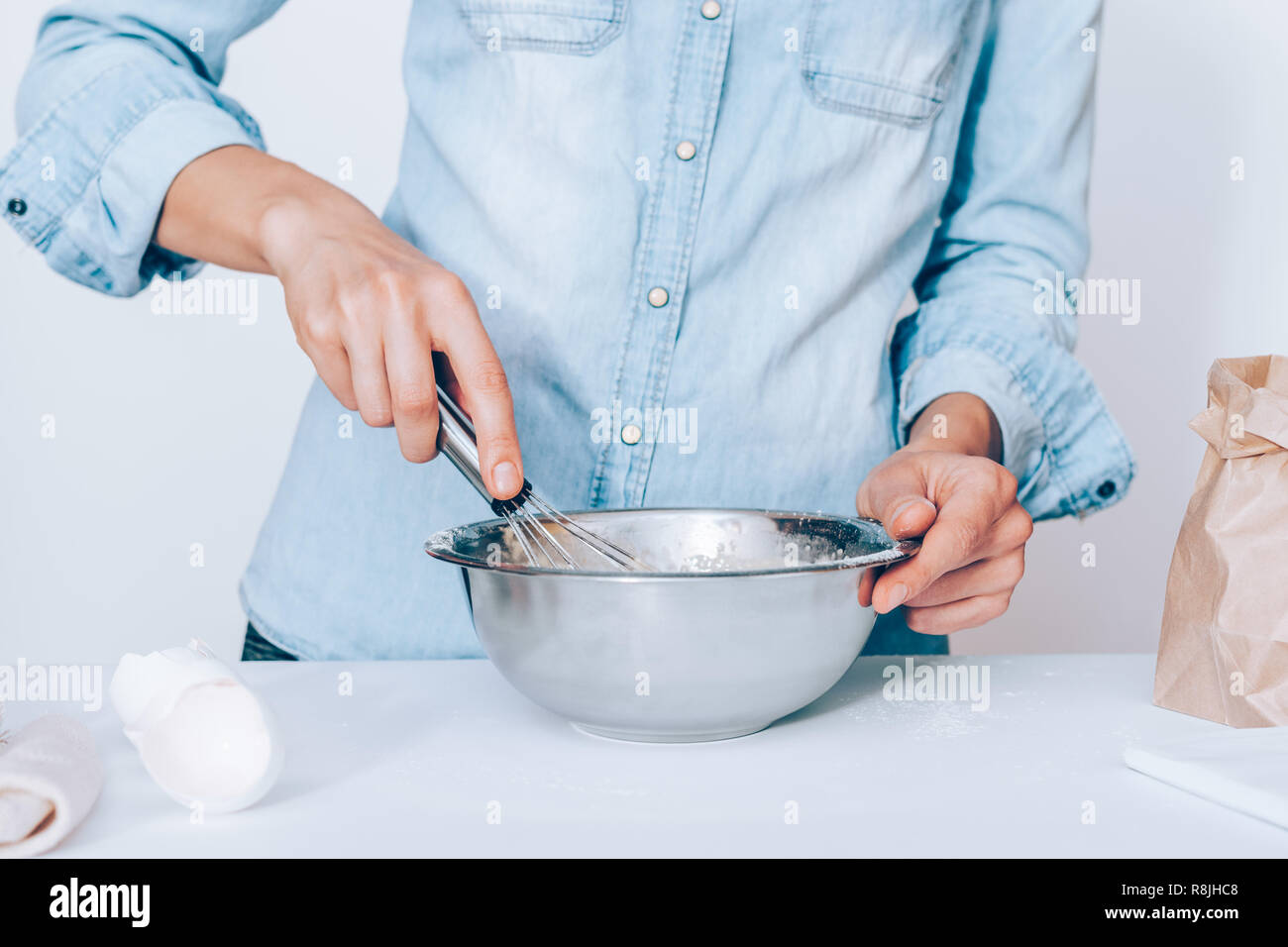 Close up woman whisking blue hi-res stock photography and images - Alamy