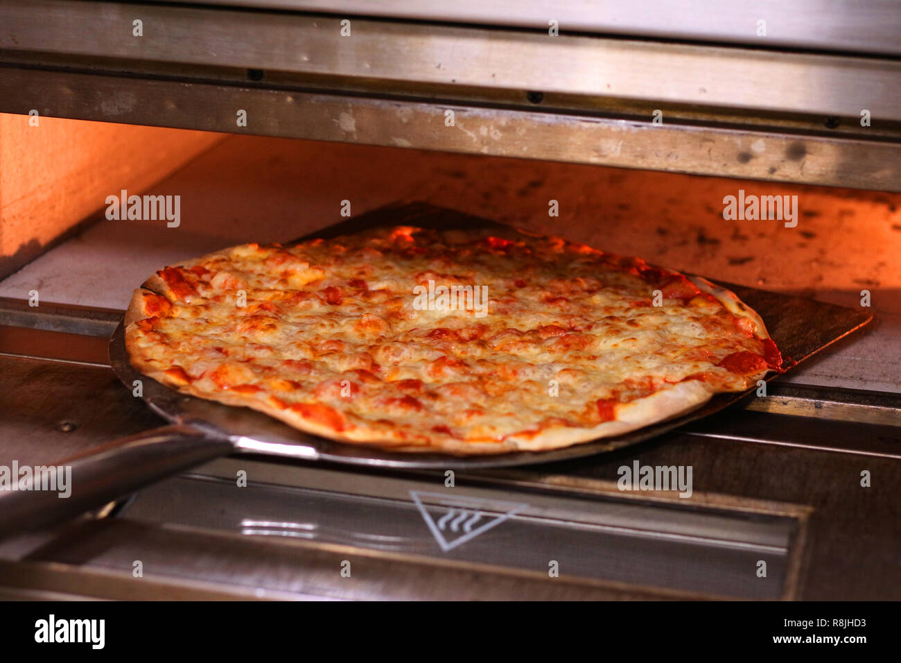 Bake pizza in furnace hi-res stock photography and images - Alamy