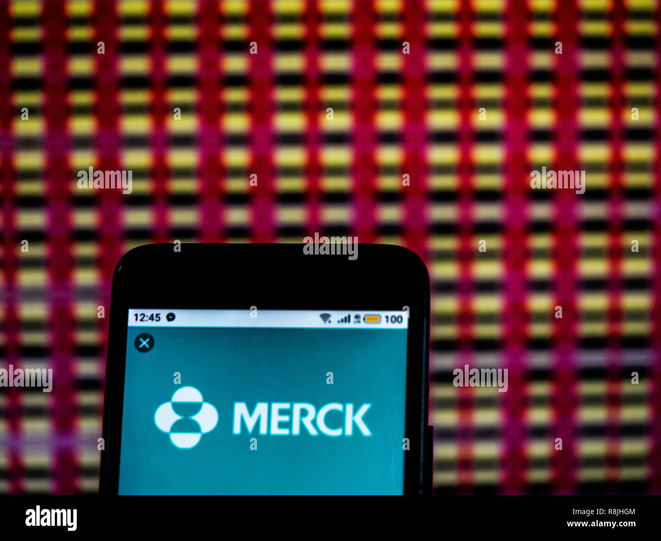 Merck & Co. Pharmaceutical company logo seen displayed on smart phone ...