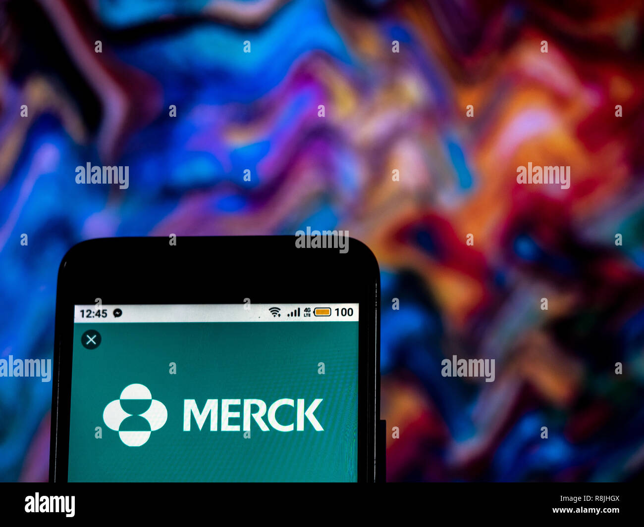 Merck & Co. Pharmaceutical company logo seen displayed on smart phone ...